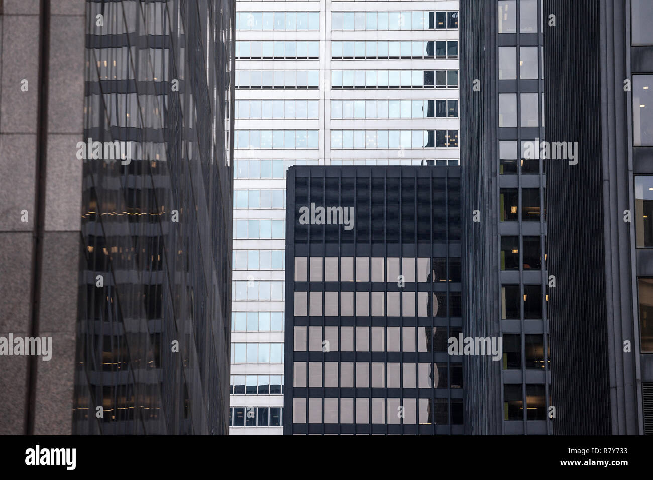 Skyscrapers facades, office buildings standing in front of each others ...