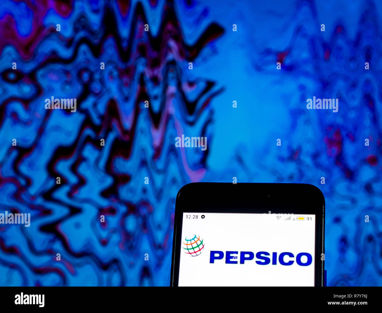 PepsiCo Food company logo seen displayed on smart phone Stock Photo - Alamy