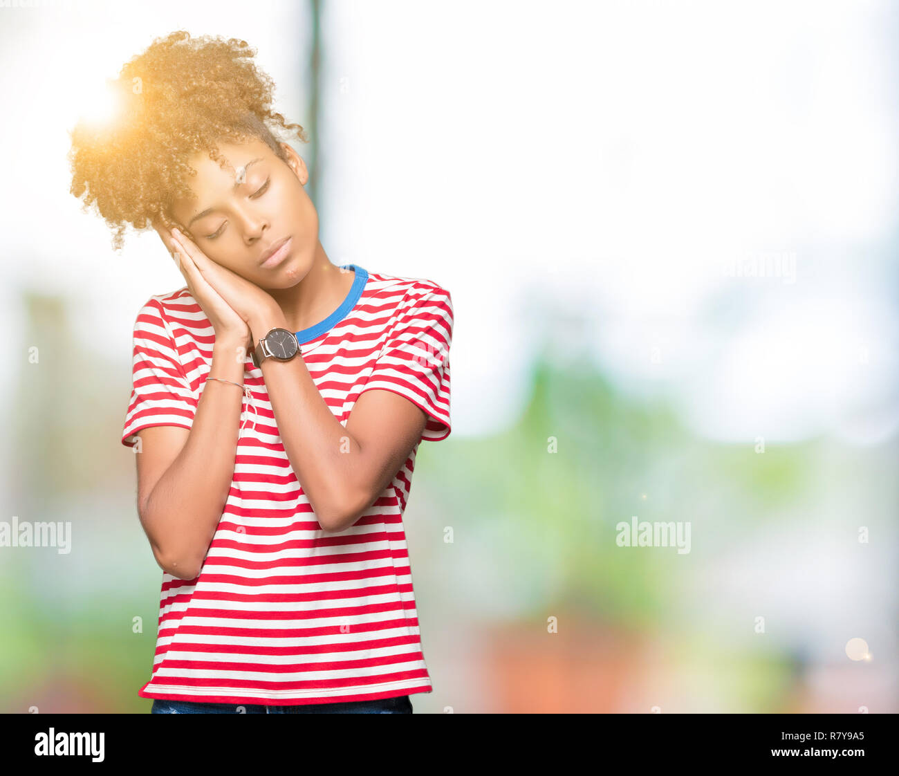 Beautiful young african american woman over isolated background ...