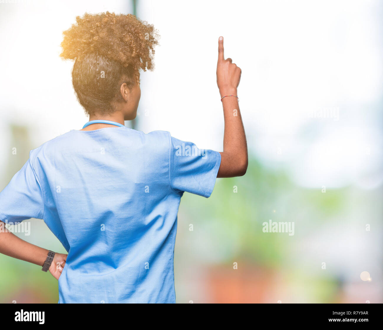 Young african american doctor woman over isolated background Posing ...