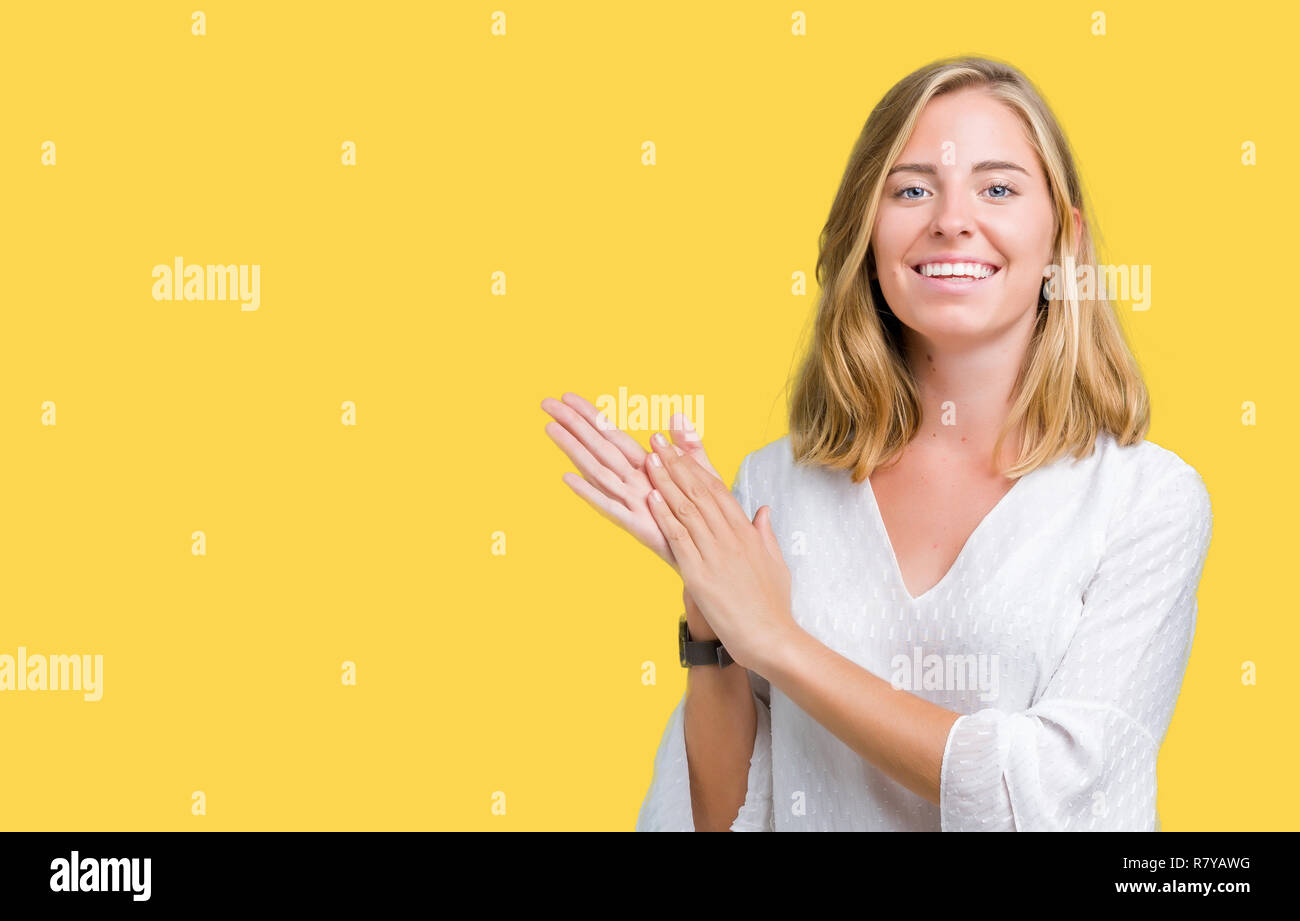 Attractive young woman clapping hands hi-res stock photography and ...