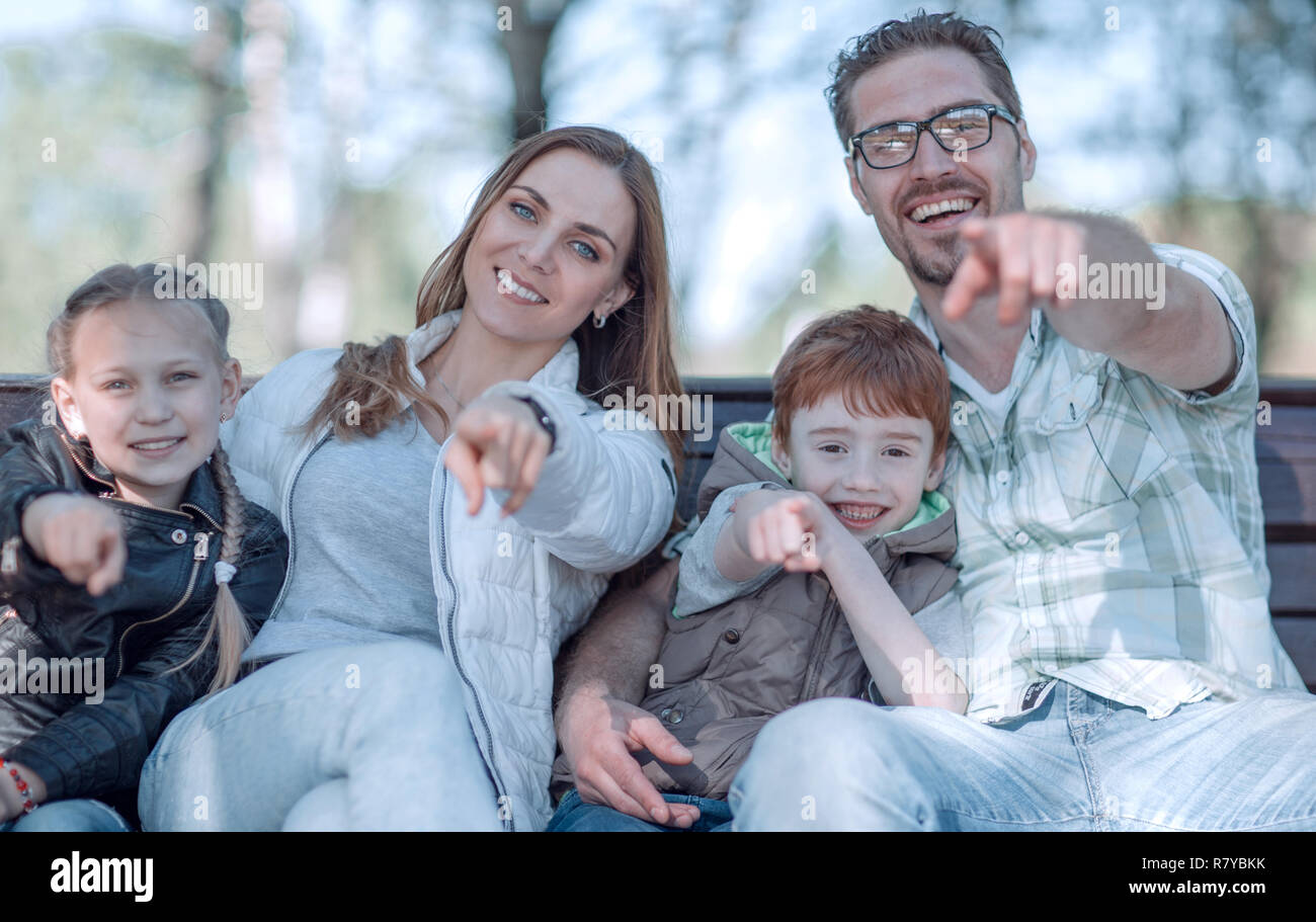 close up.happy family pointing at you Stock Photo - Alamy