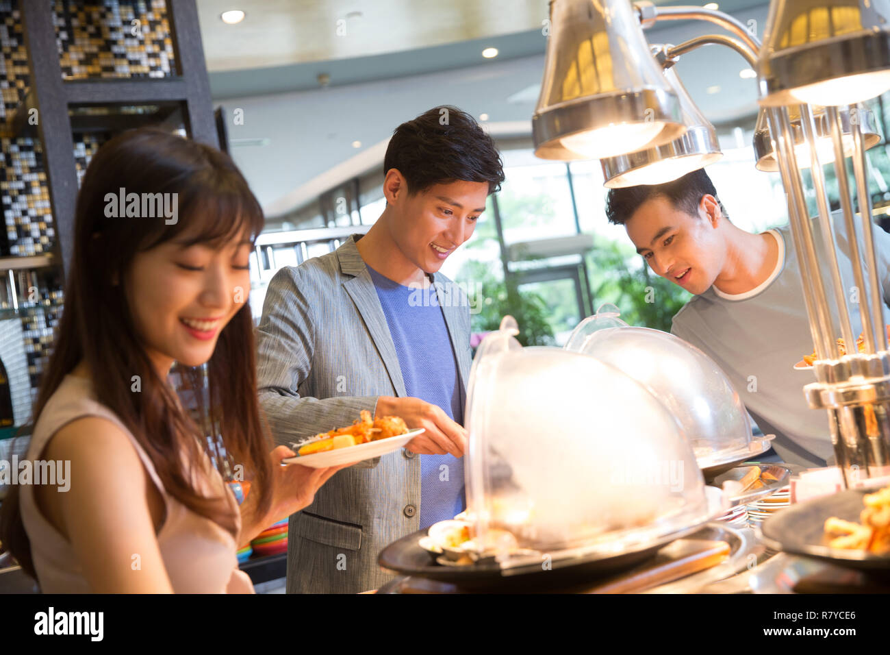 Young people the buffet Stock Photo - Alamy