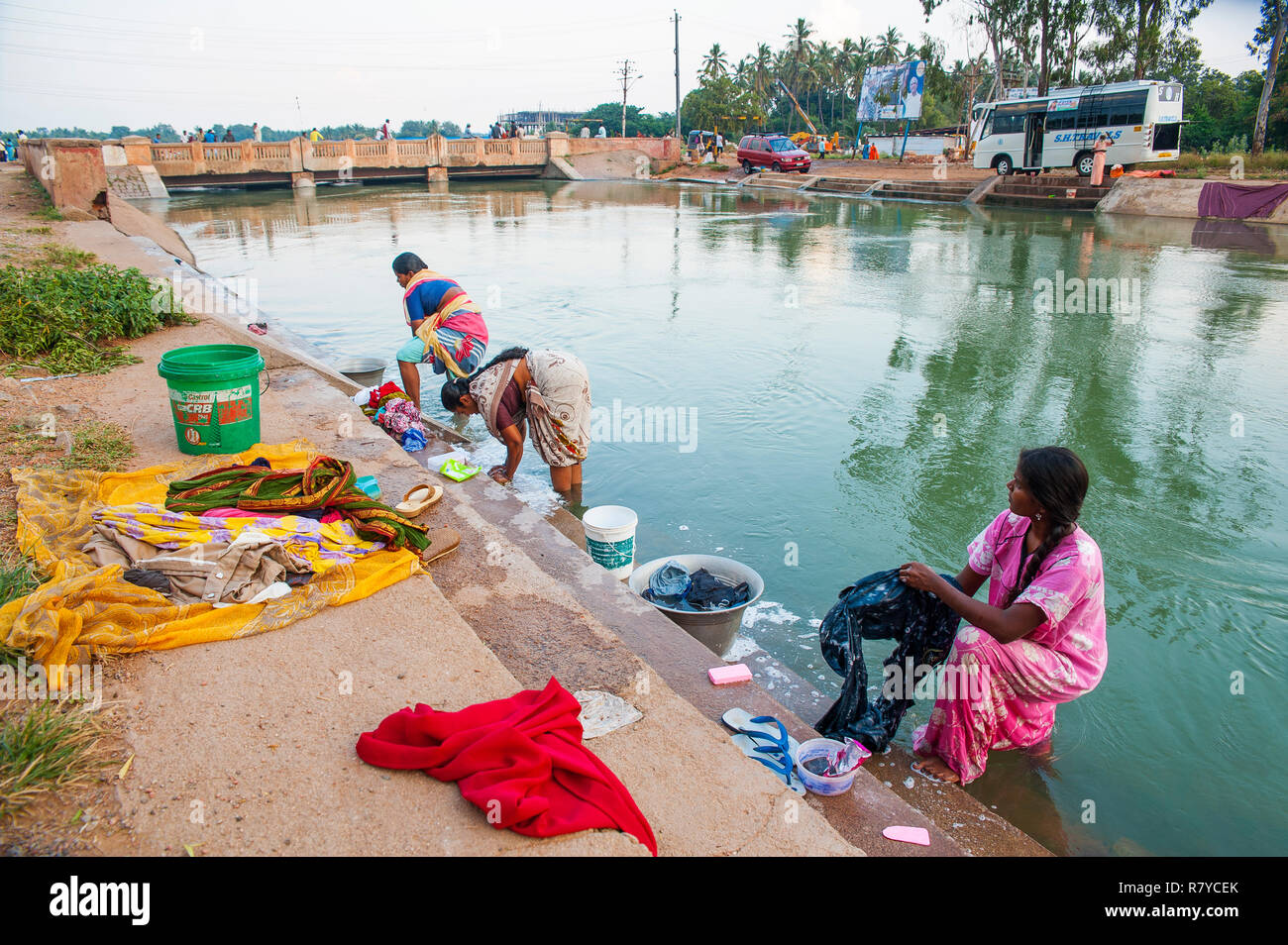 Indian girl washing clothes hi-res stock photography and images - Alamy