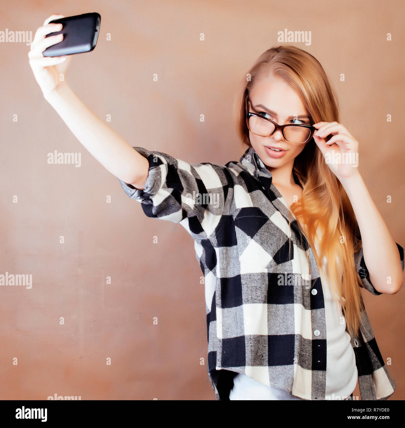young pretty girl teenager in glasses making selfie at school, s Stock ...