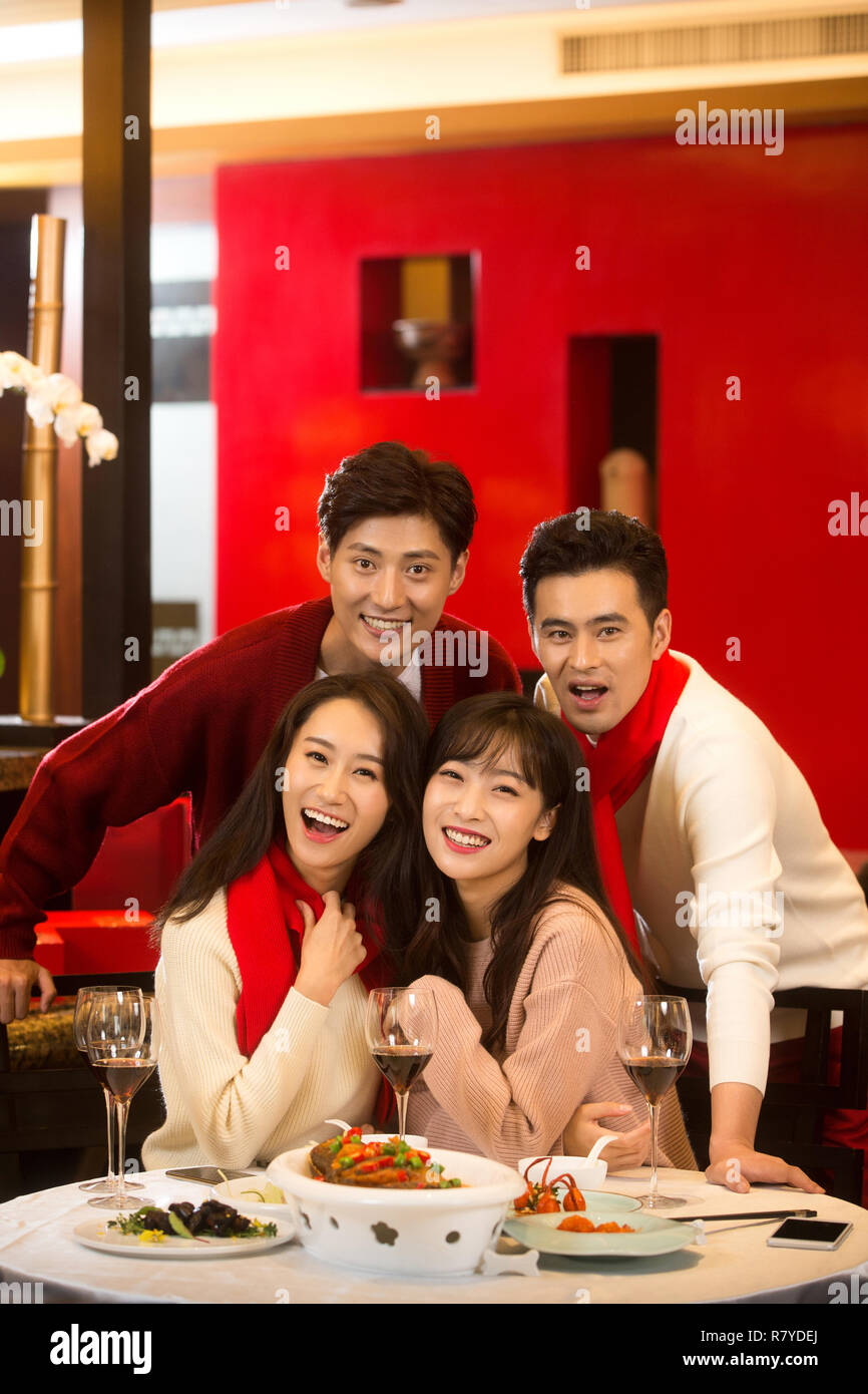 Young people in the restaurant for dinner Stock Photo - Alamy
