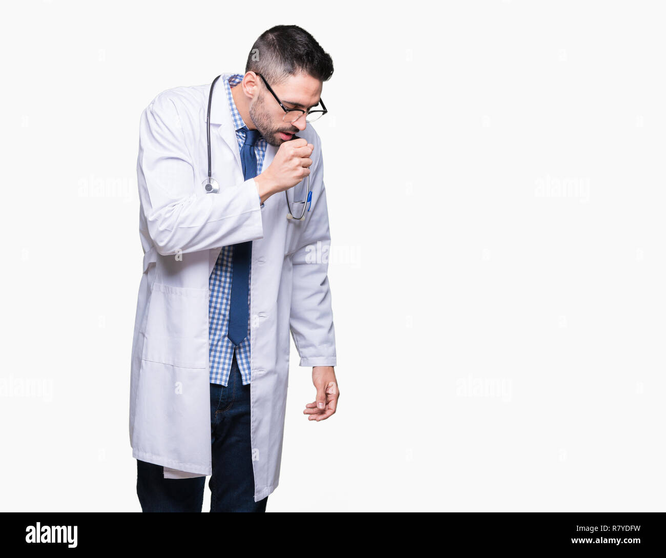Handsome young doctor man over isolated background feeling unwell and ...