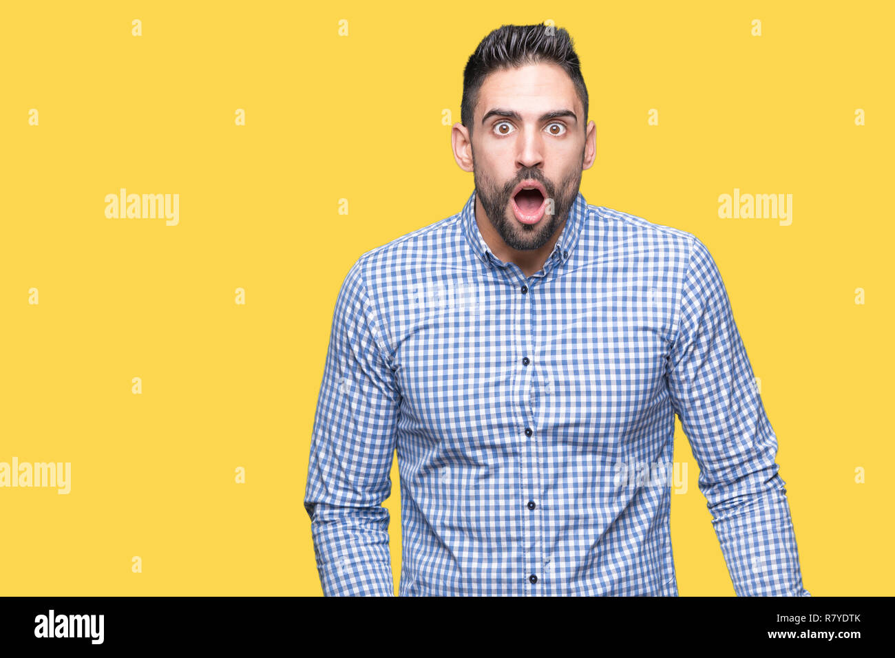 Young handsome man over isolated background In shock face, looking ...