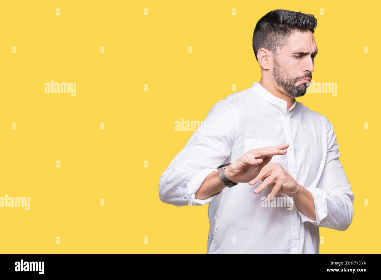 Young business man over isolated background disgusted expression ...