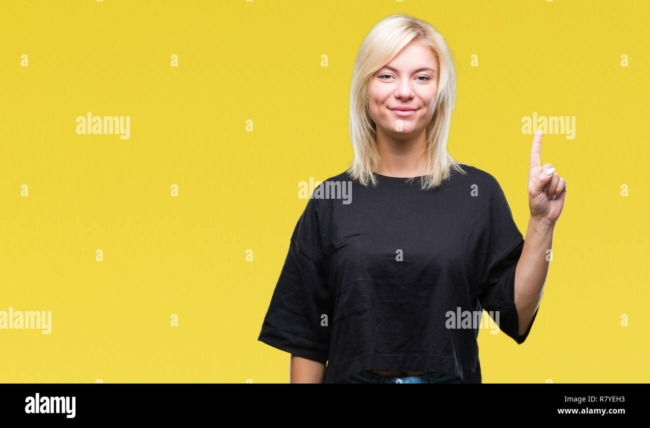 Young beautiful blonde woman over isolated background showing and ...