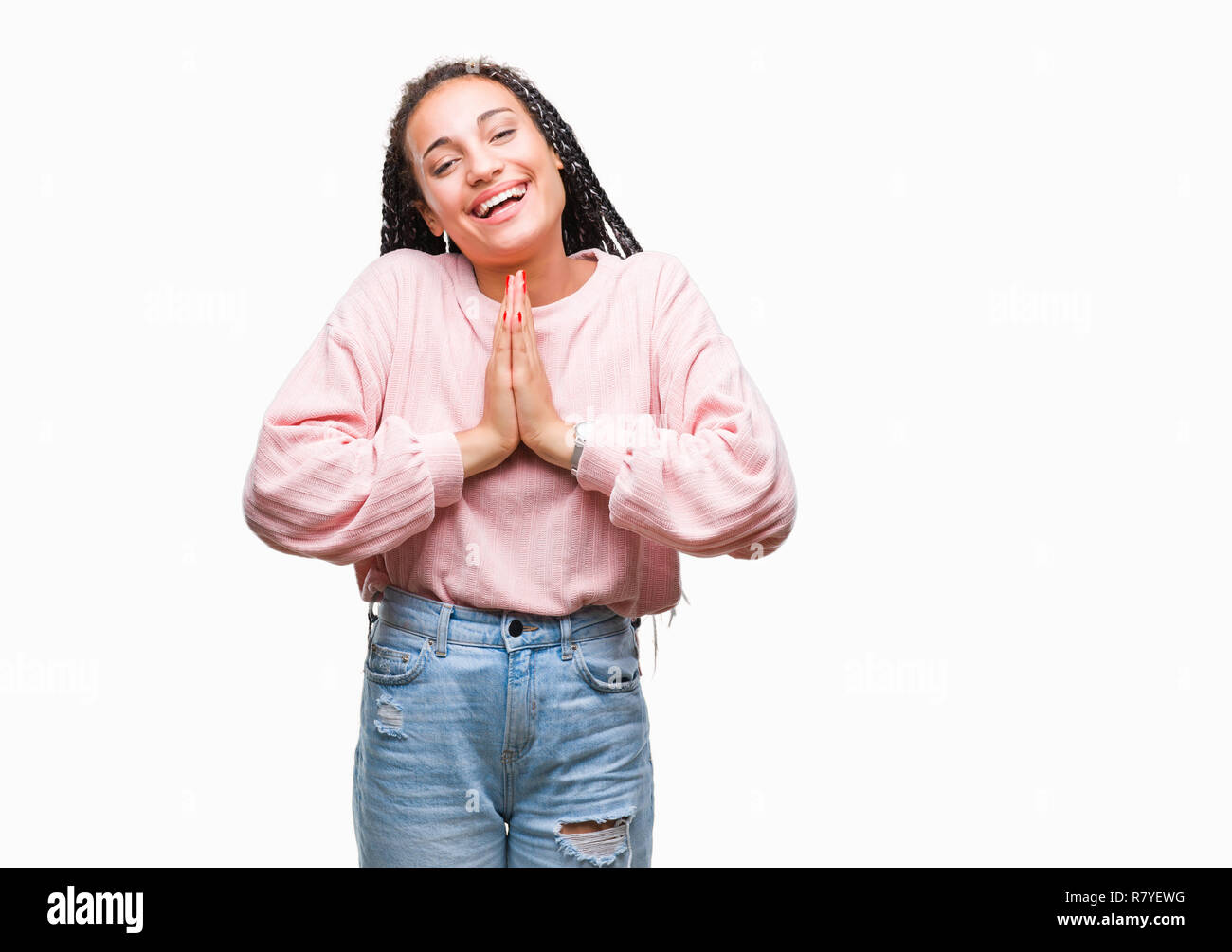 Young braided hair african american girl wearing sweater over isolated ...