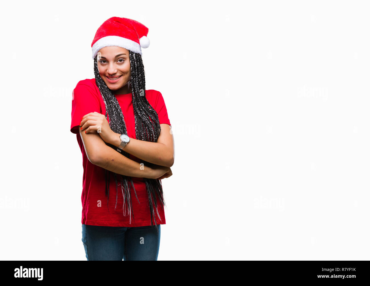 Young braided hair african american girl wearing christmas hat over ...