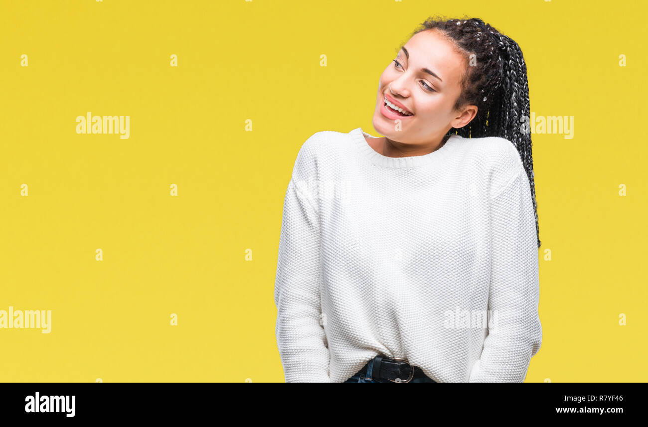 Young braided hair african american girl wearing winter sweater over ...