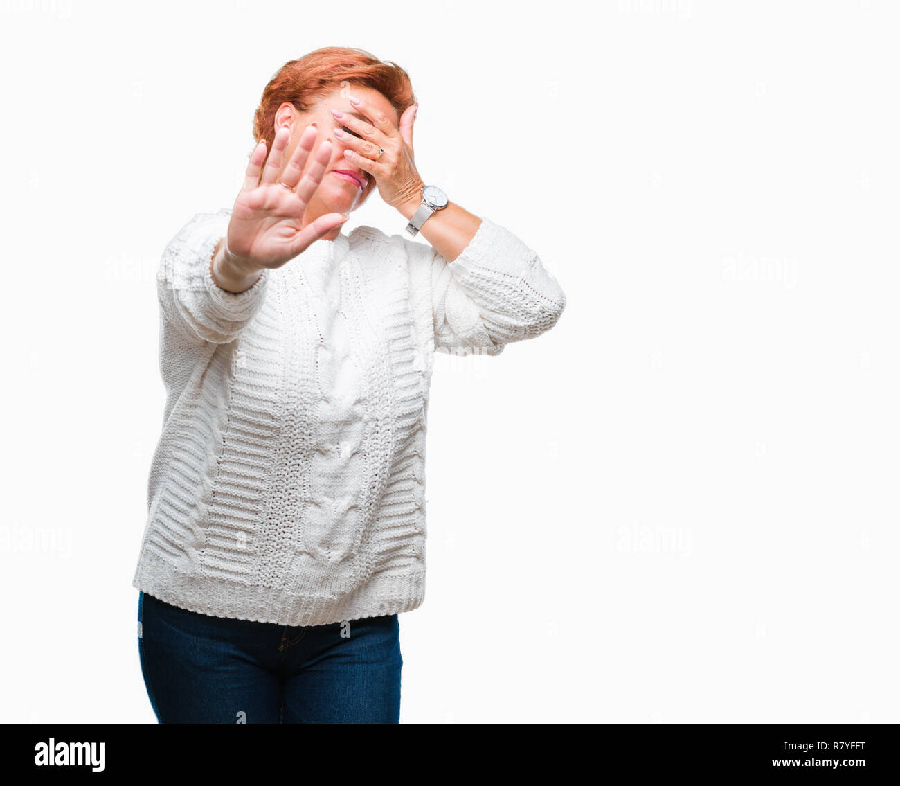 Senior woman cover eyes Cut Out Stock Images & Pictures - Alamy