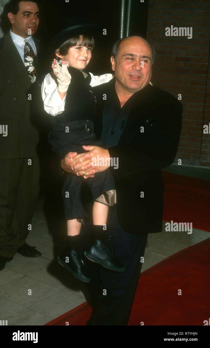 WESTWOOD, CA - MARCH 30: Actors Miko Hughes and Danny DeVito attend the ...