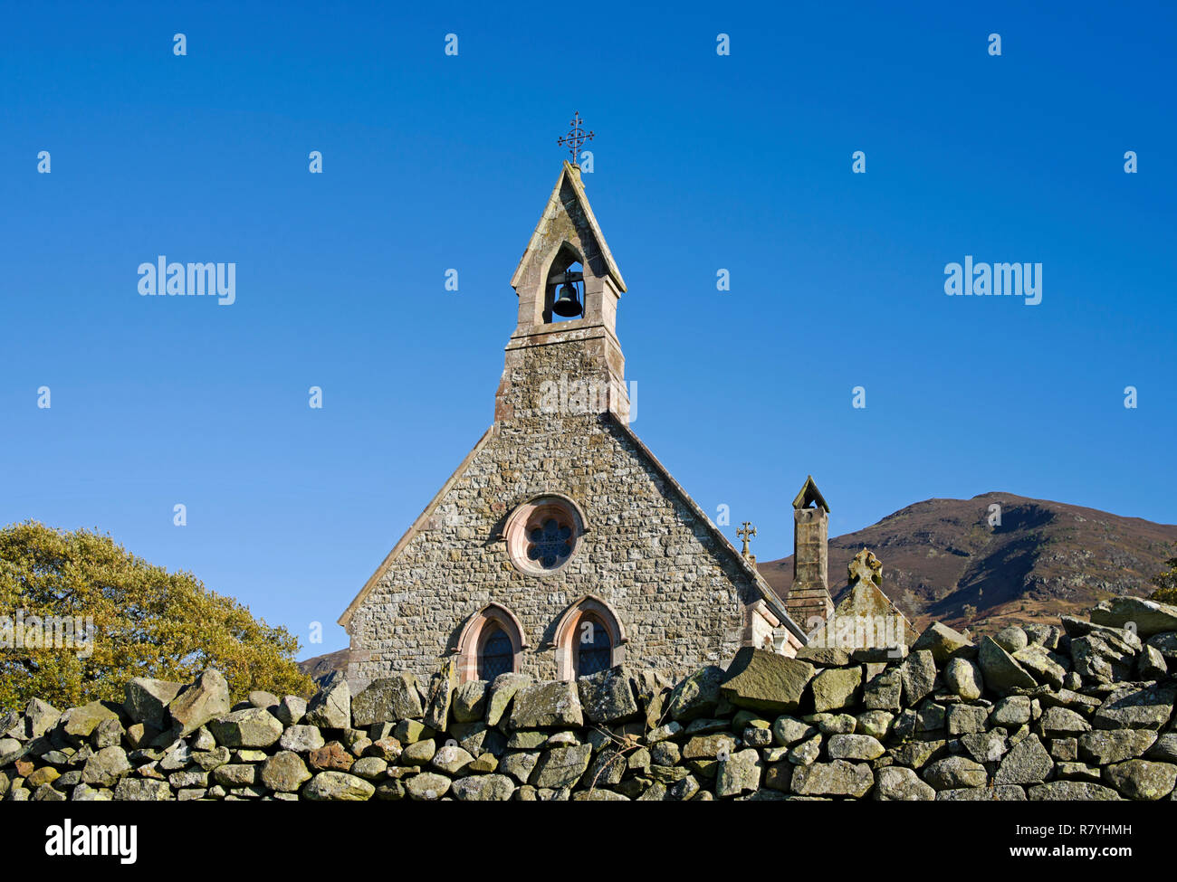 Bell tower and stone-built gable wall of St Bega's Church ...