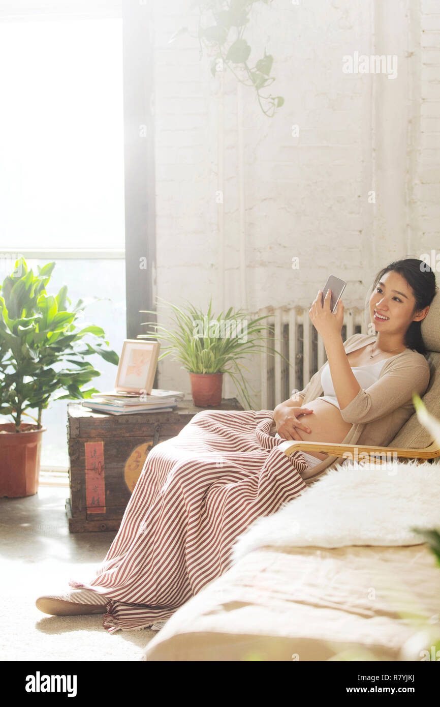 Pregnant women to family life Stock Photo - Alamy