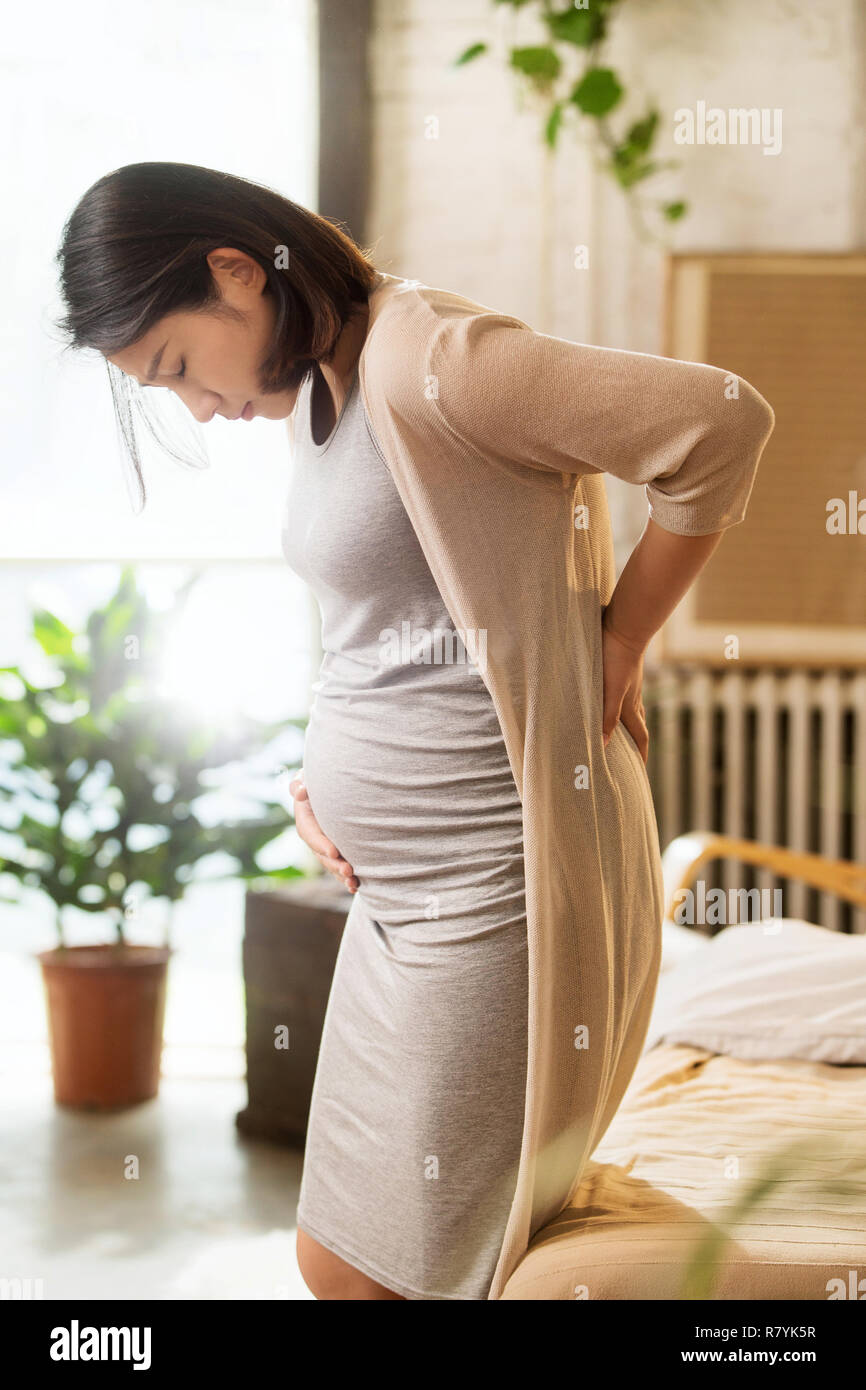 Pregnant pain face hi-res stock photography and images - Alamy