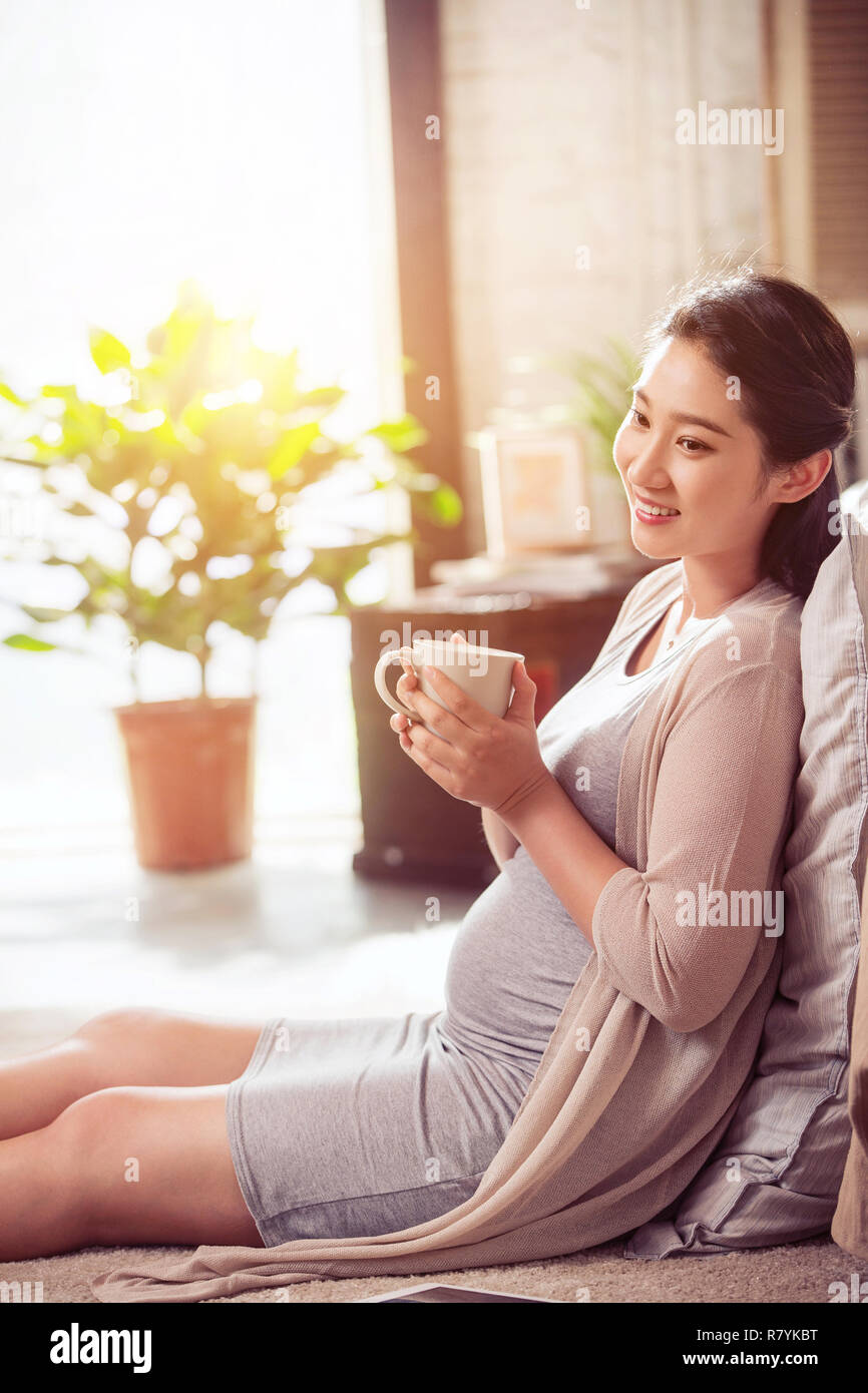 Pregnant women to family life Stock Photo - Alamy