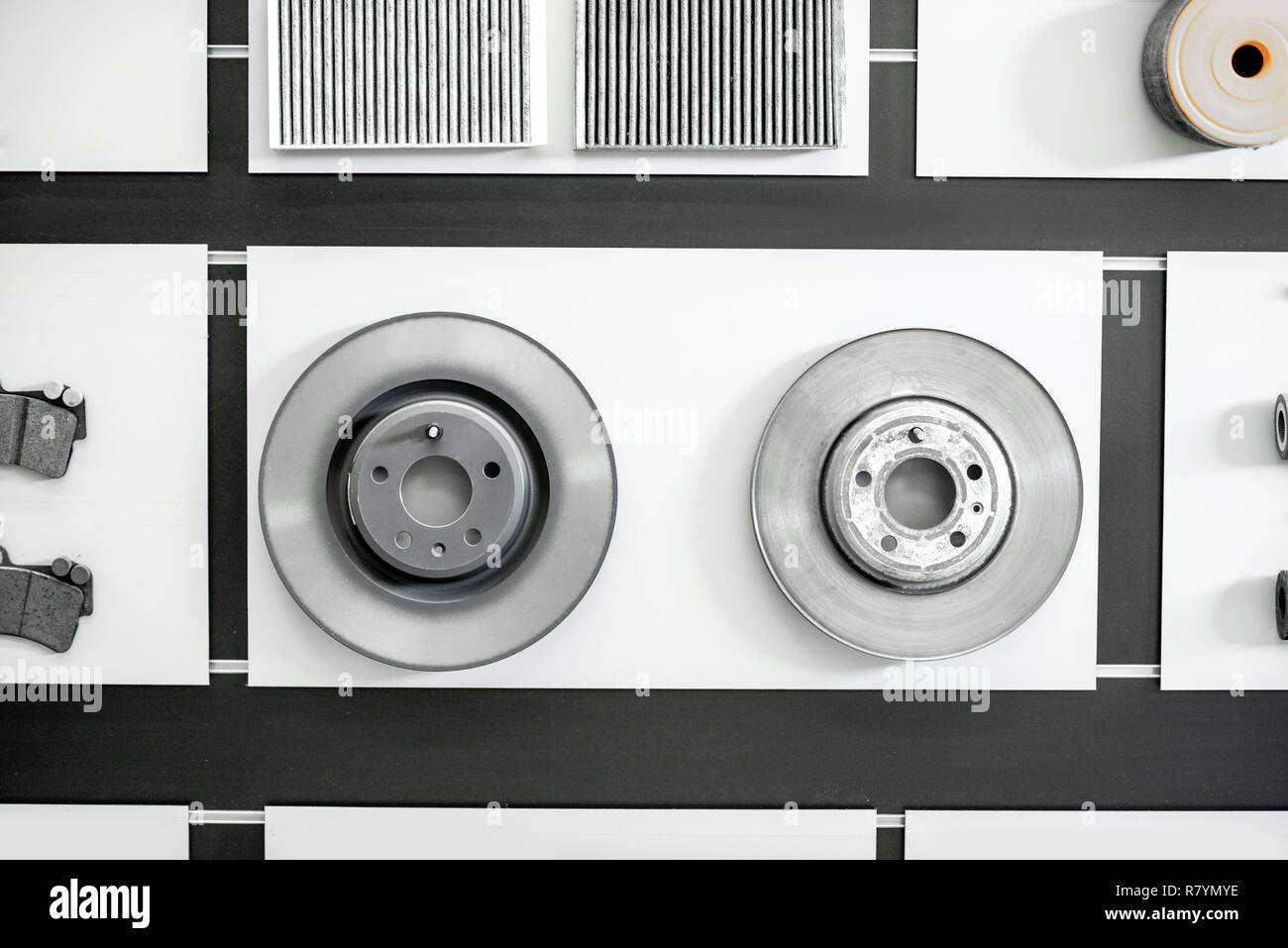 Board with new and used car disk at the car service Stock Photo - Alamy