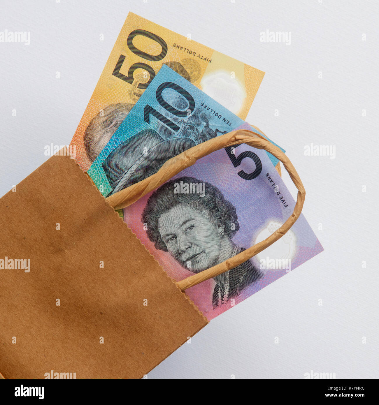Australian fifty dollar notes in a brown bag Stock Photo - Alamy