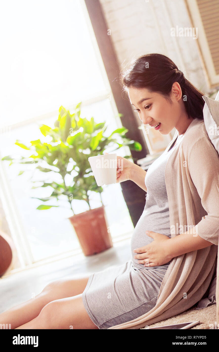 Pregnant women to family life Stock Photo - Alamy