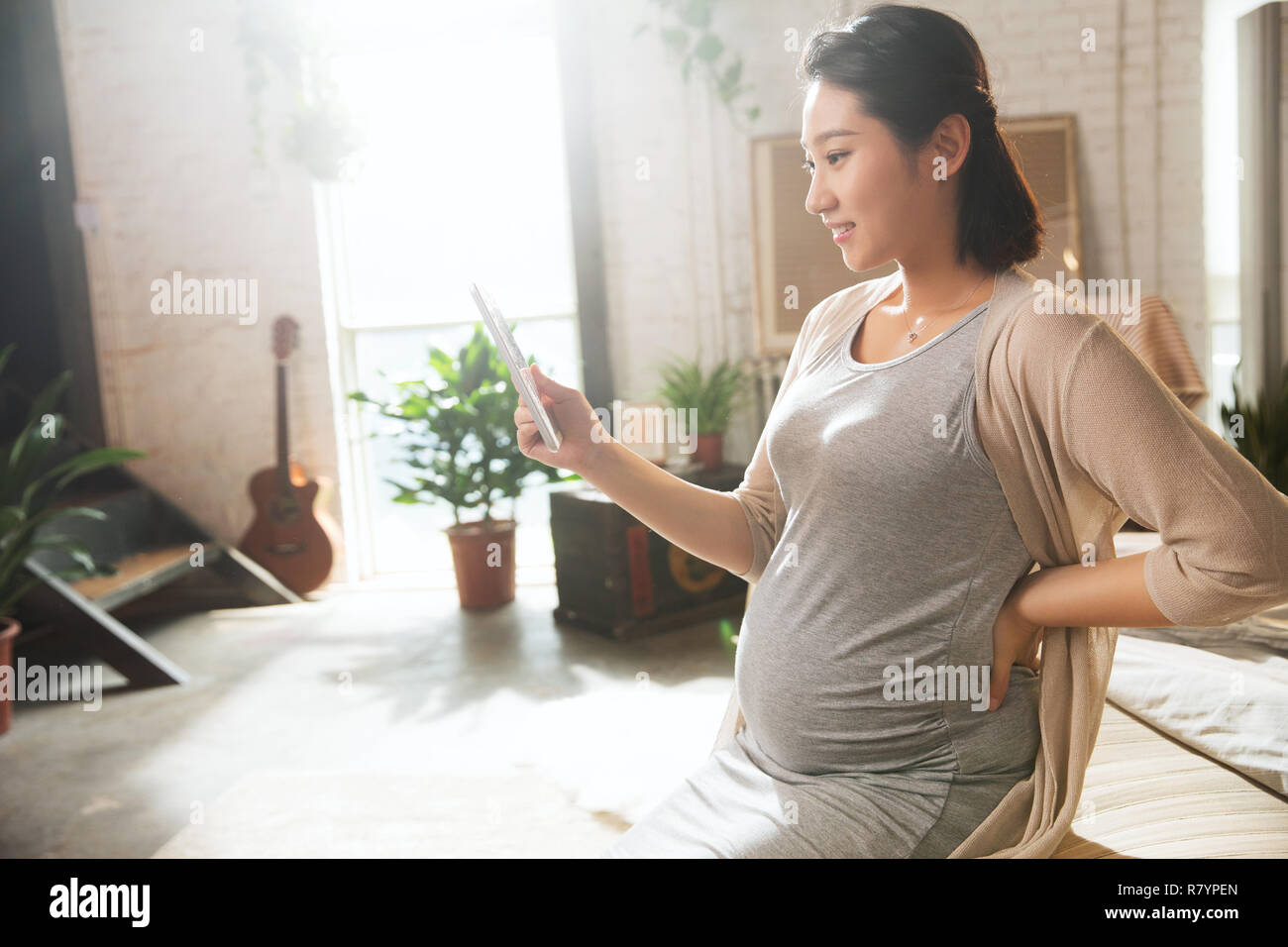 Pregnant women to family life Stock Photo - Alamy