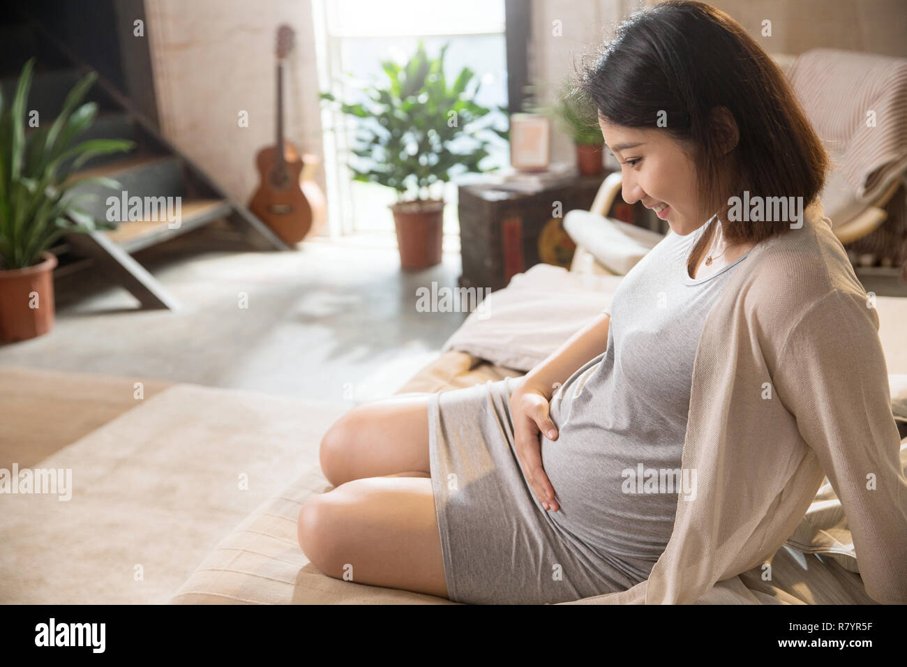 Pregnant women to family life Stock Photo - Alamy