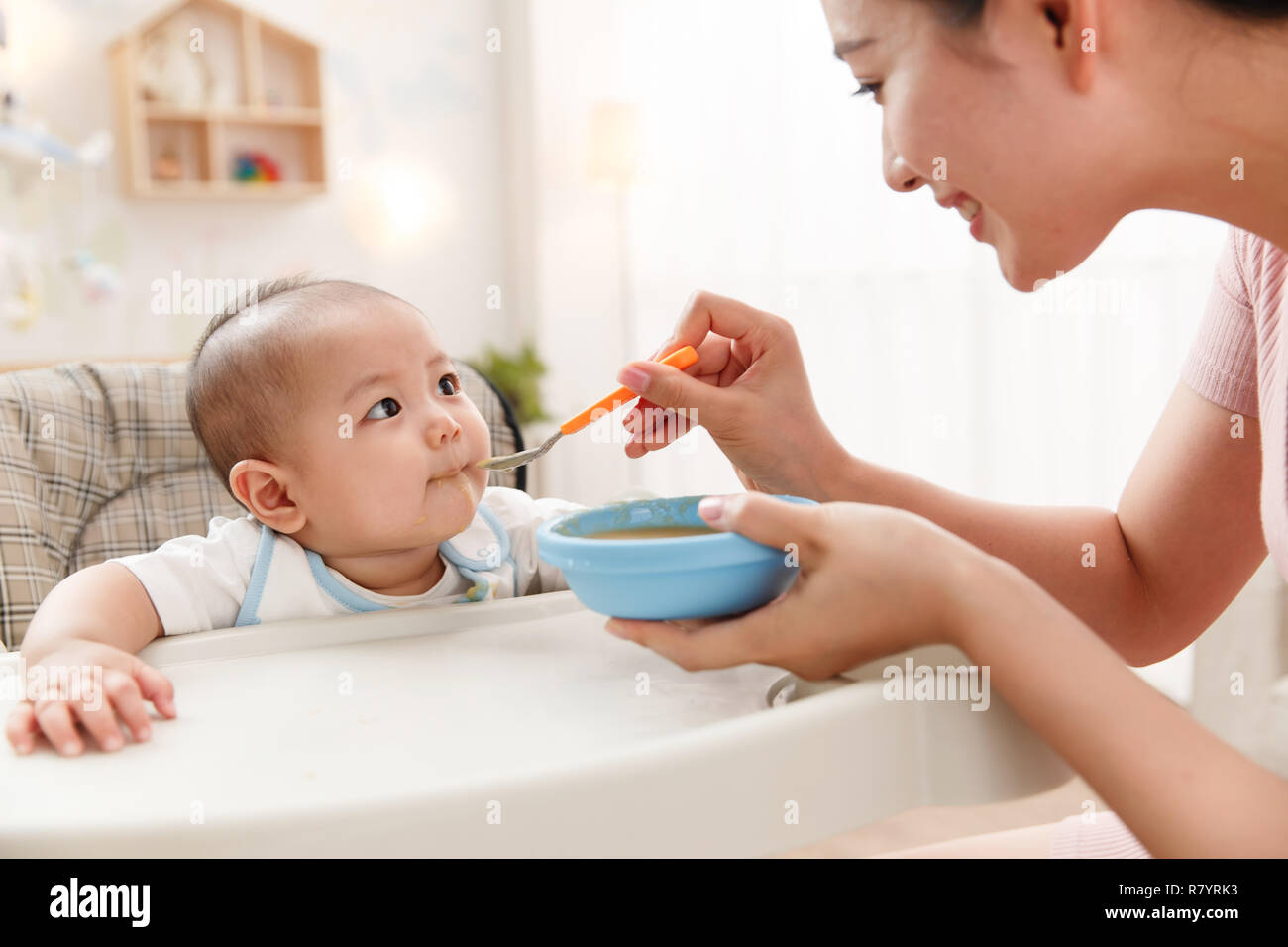Mother to feed the baby Stock Photo - Alamy