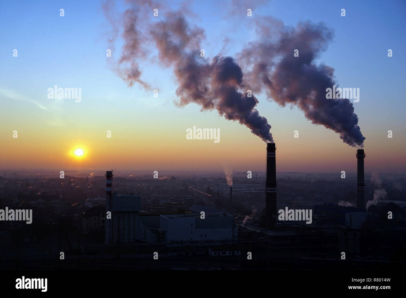 High smoke stacks in the morning Stock Photo - Alamy