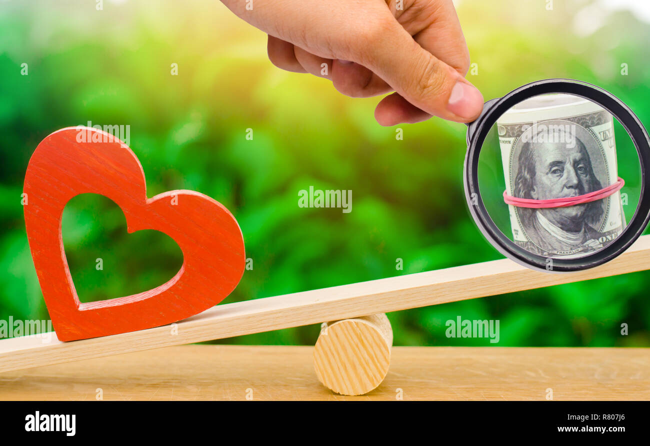 Money versus love concept. Passion versus profit. Family or career ...