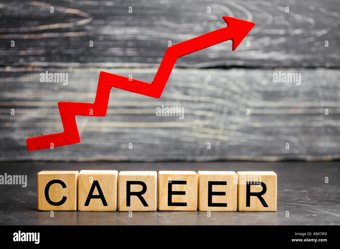 Wooden blocks with the words "Career" and the up arrow. personal and ...