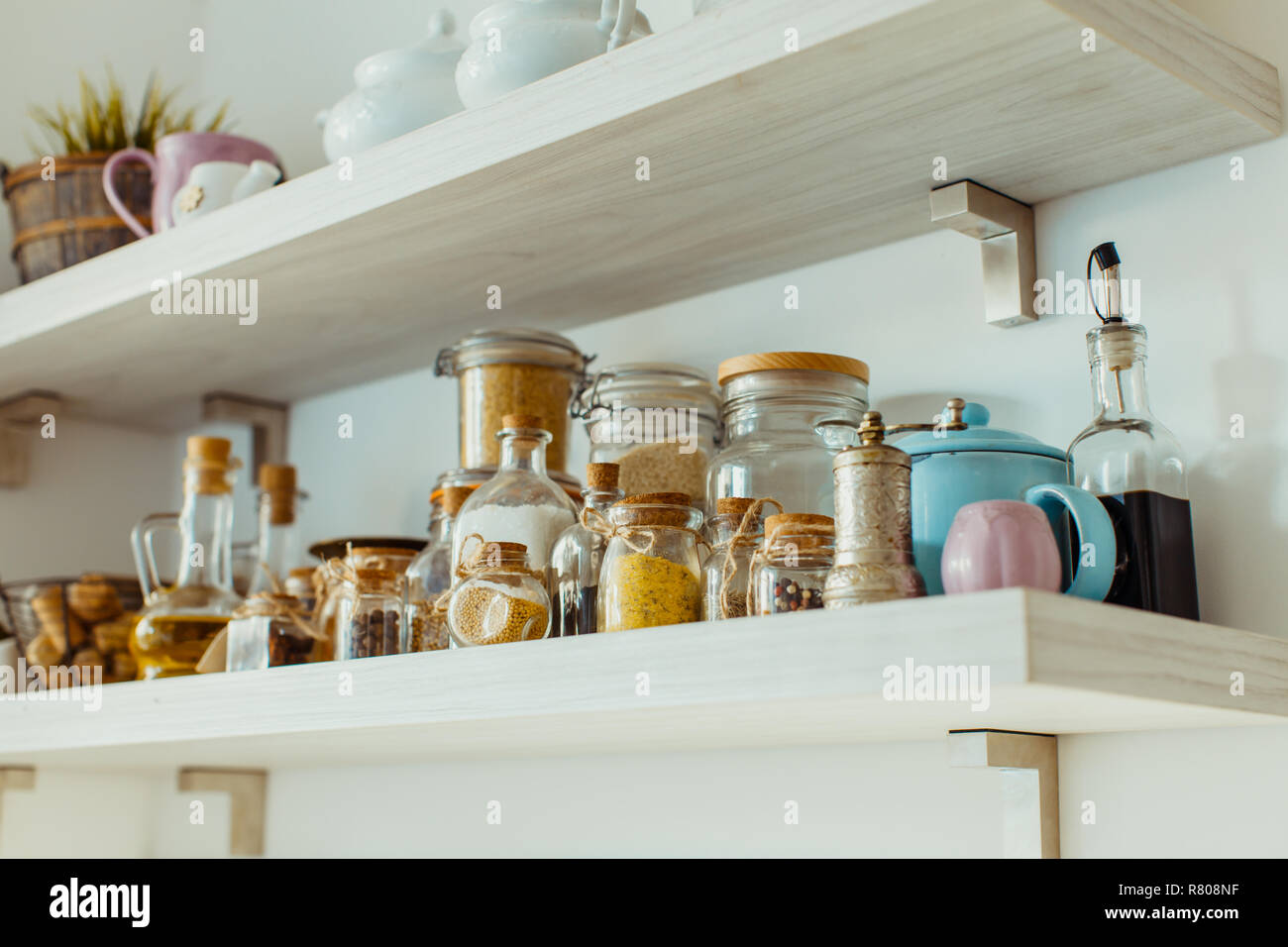 Open shelves with various food and spice ingredients Stock Photo - Alamy