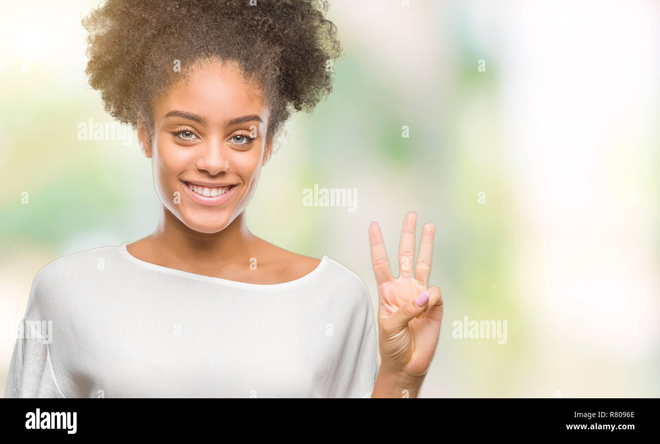 Young afro american woman over isolated background showing and pointing ...