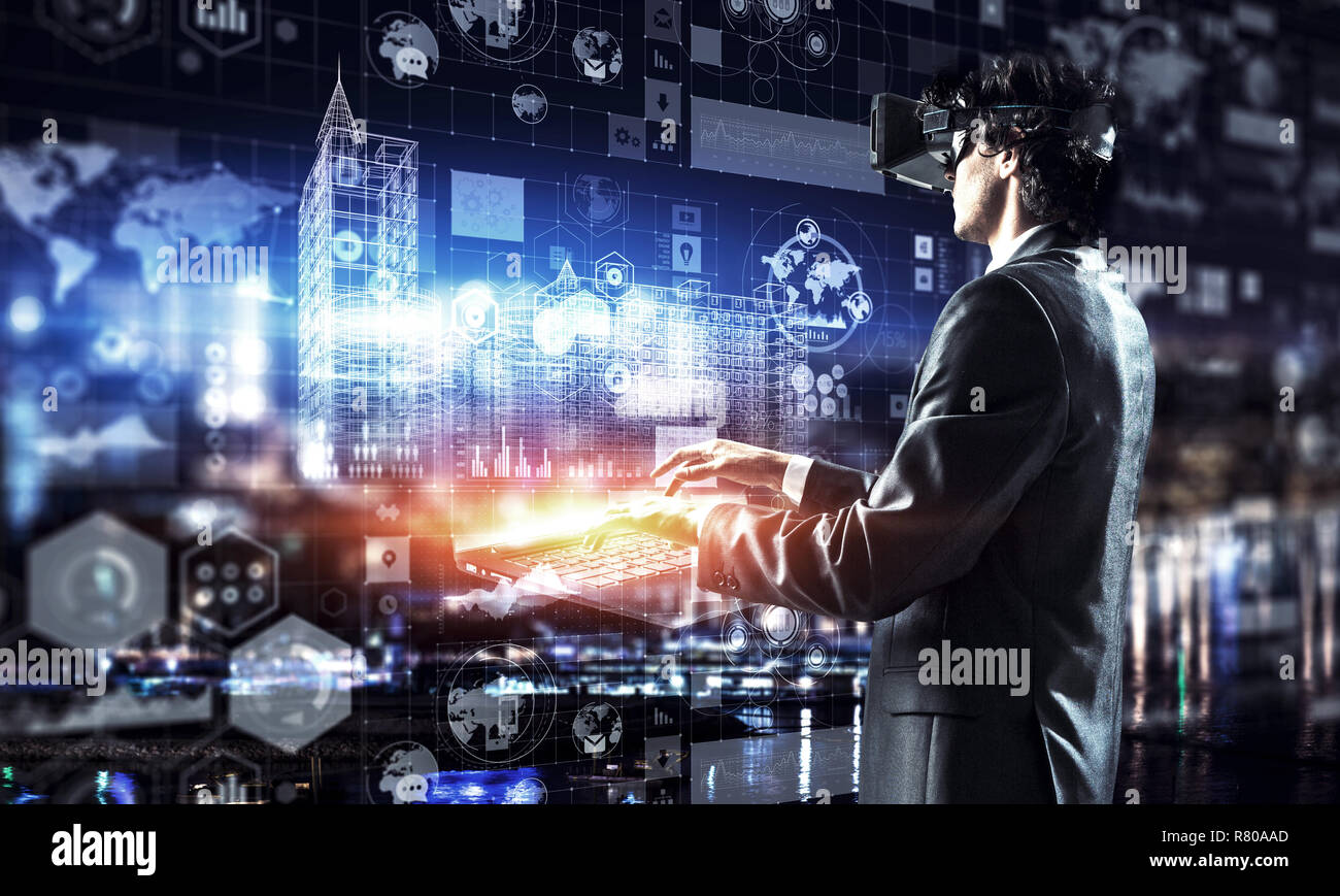 Experiencing impressive virtual reality. Mixed media Stock Photo - Alamy