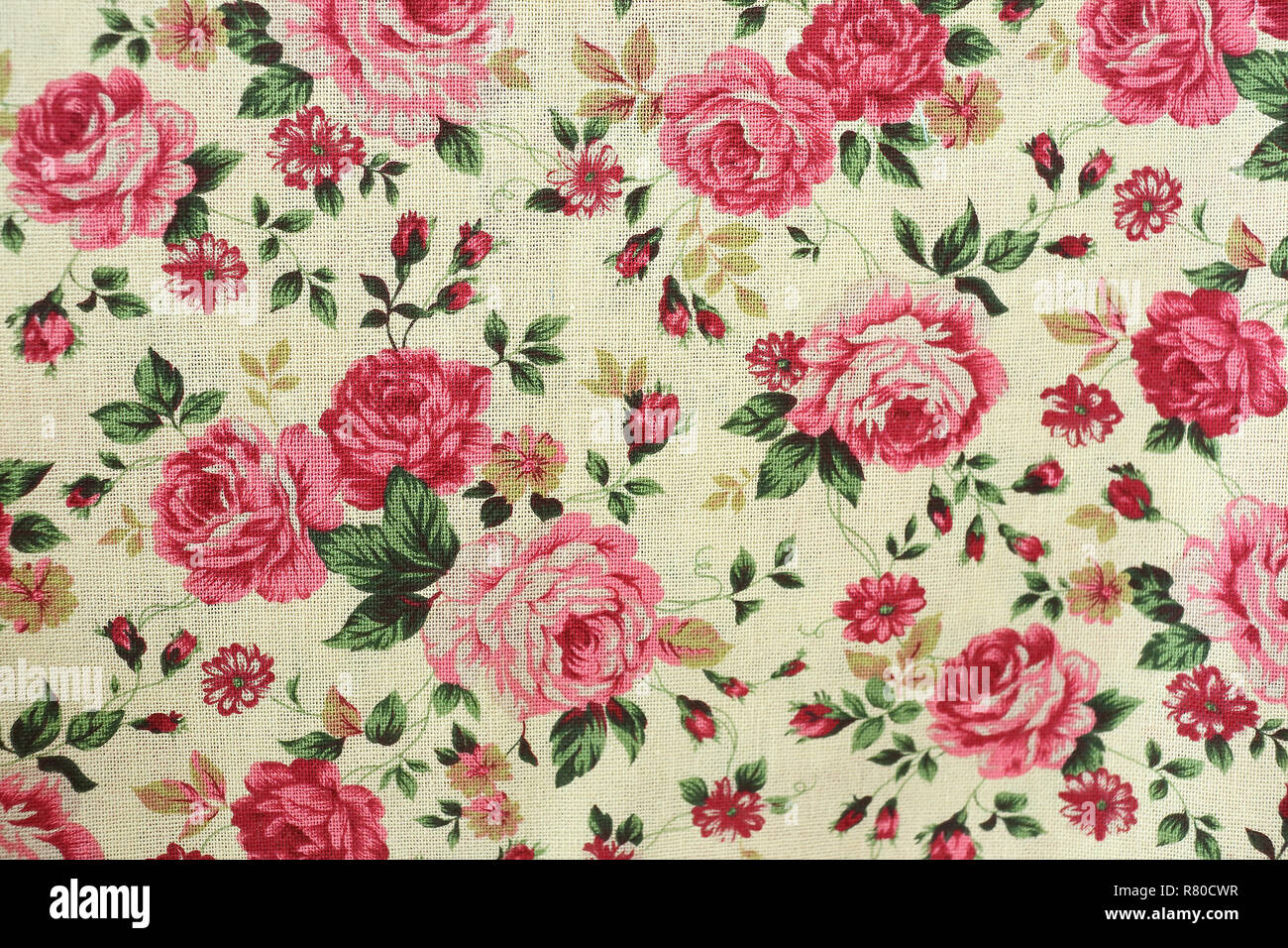 Rose design seamless pattern on fabric background Stock Photo - Alamy