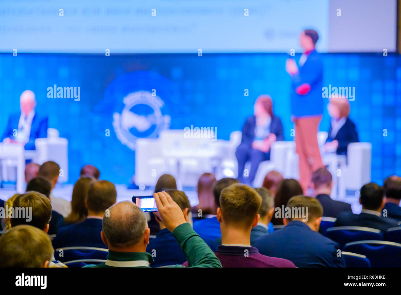 People attend business conference in the congress hall Stock Photo - Alamy