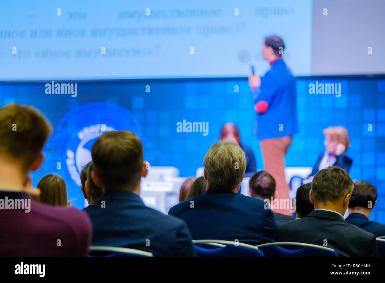 People attend business conference in the congress hall Stock Photo - Alamy