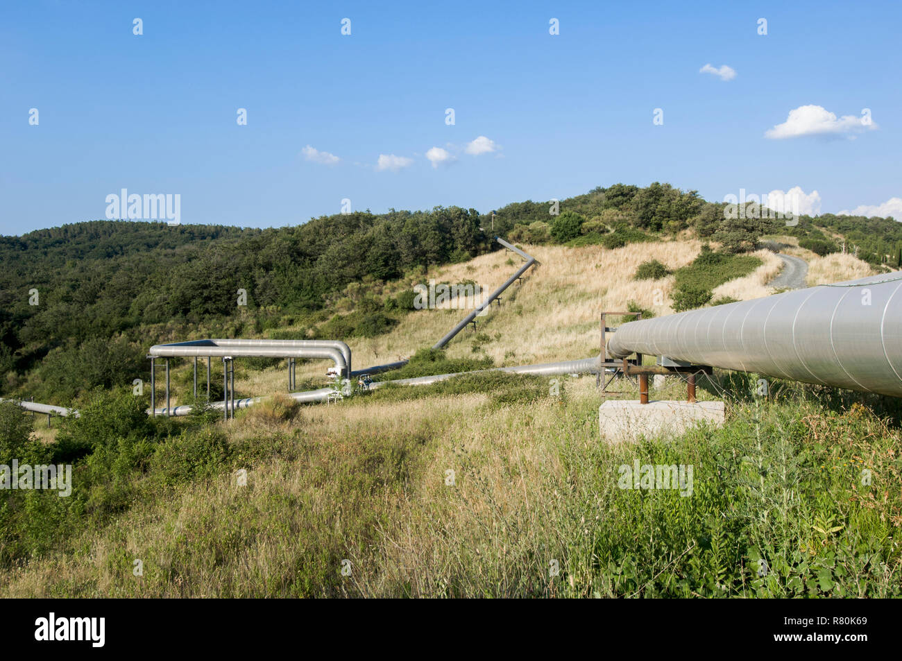 Large pipes are led through nature, Tuscany, Italy Stock Photo - Alamy