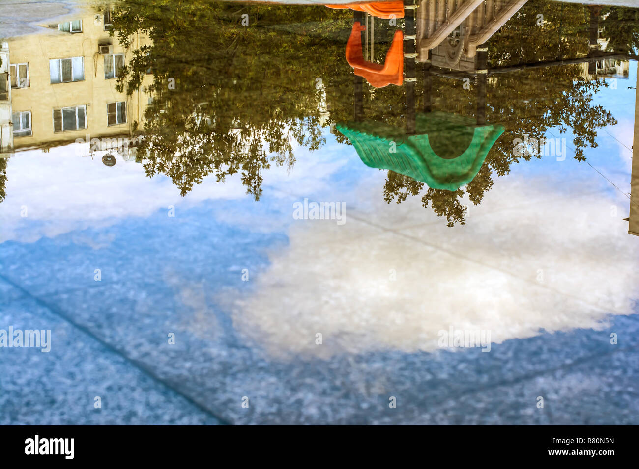 Reflection in a puddle Stock Photo - Alamy