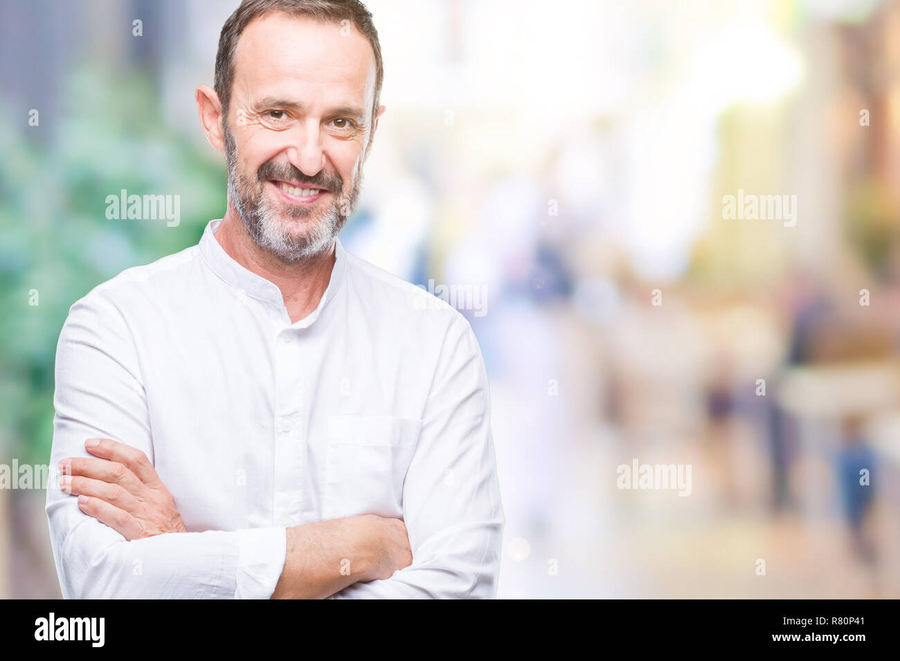 Middle age hoary senior man over isolated background happy face smiling ...