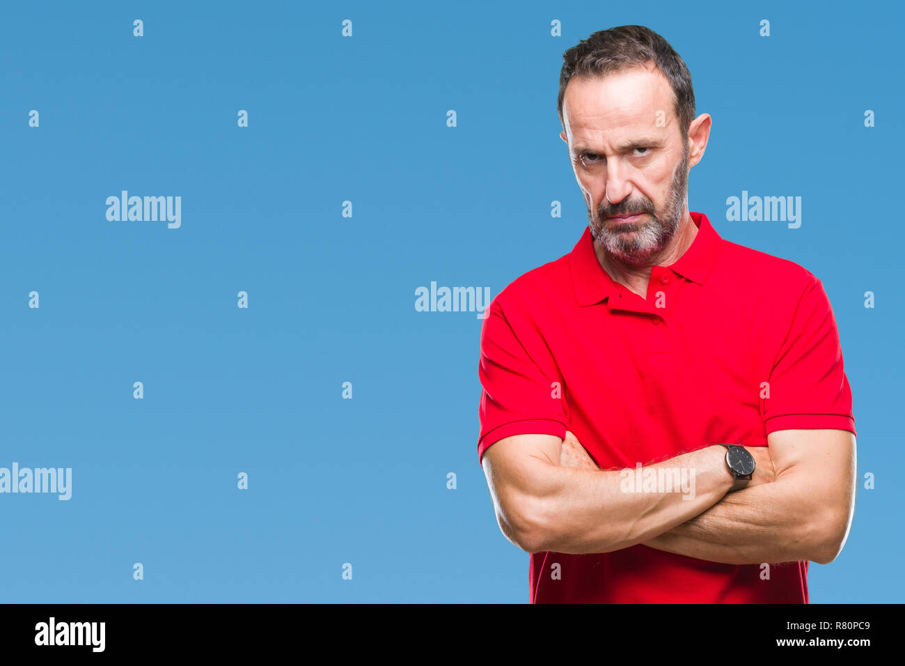 Middle age hoary senior man over isolated background skeptic and ...