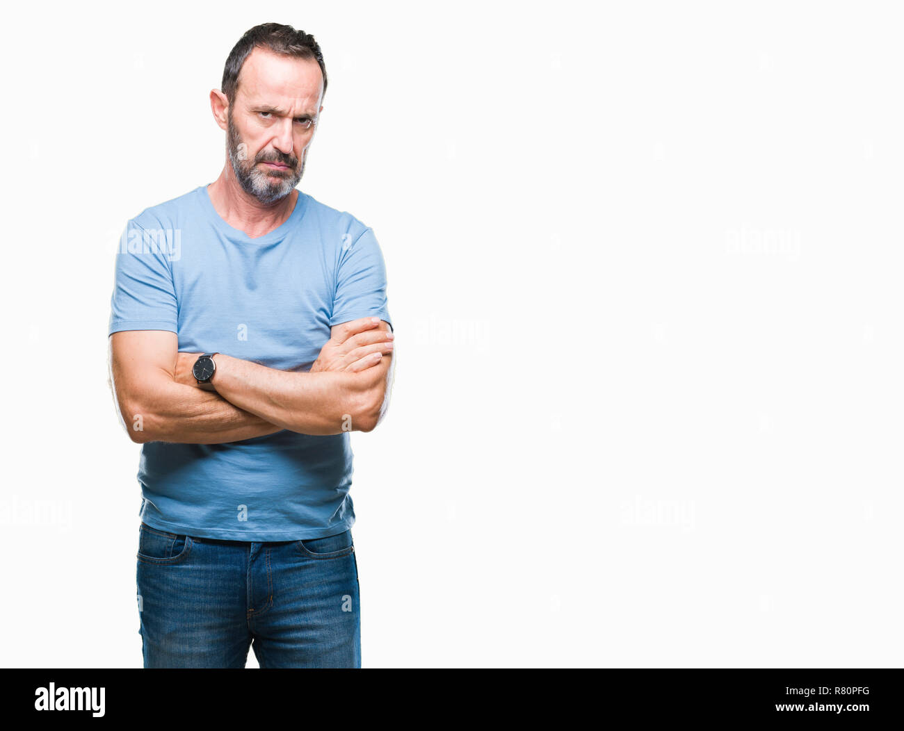 Middle age hoary senior man over isolated background skeptic and ...