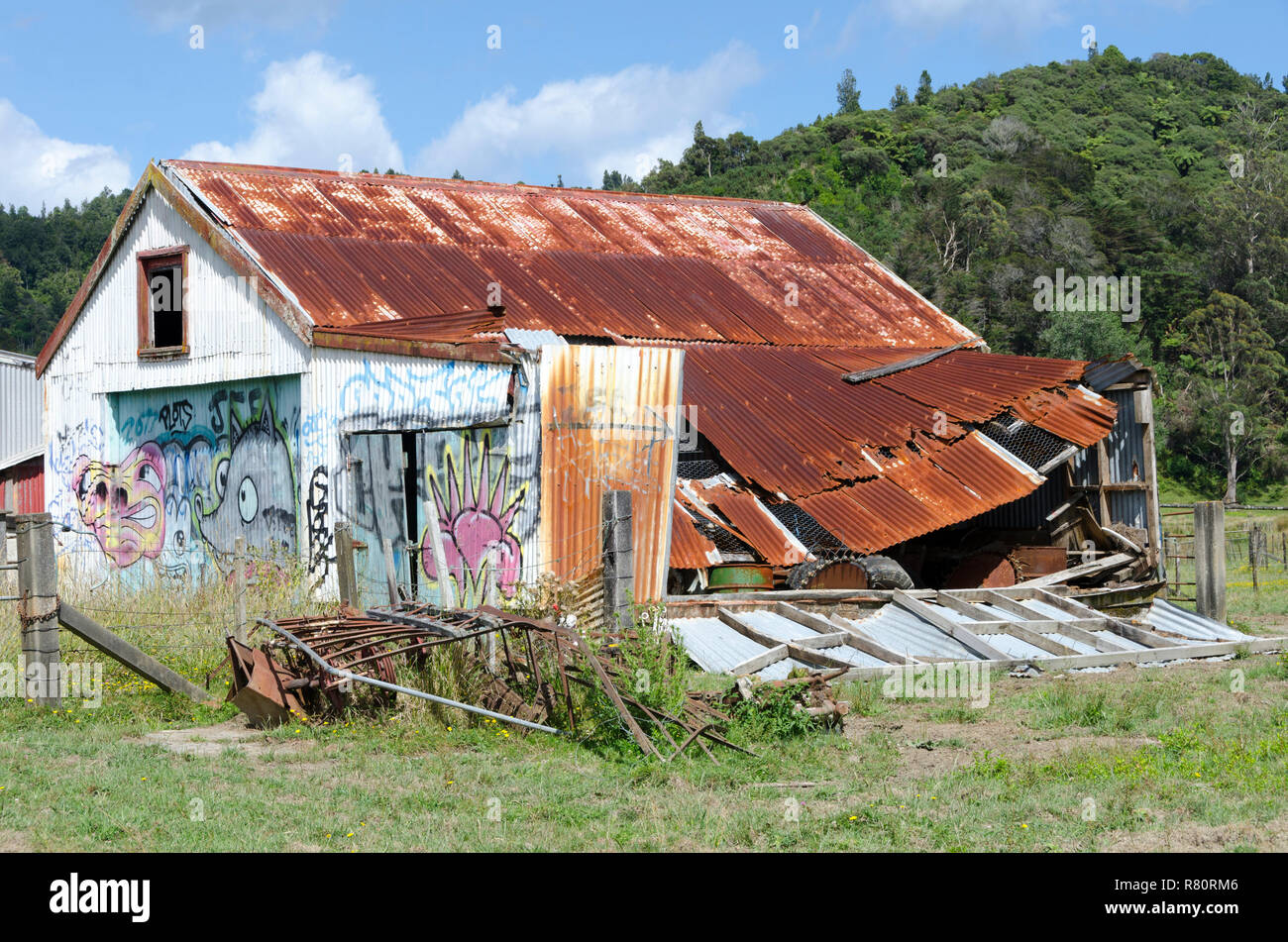Graffiti on derelict barn, Mount Messenger, Taranaki, North Island, New ...