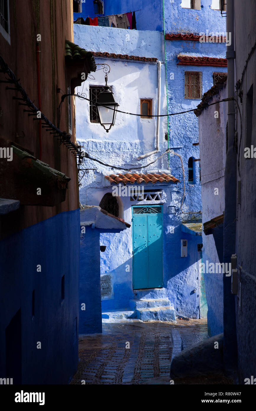 Morocco, Chefchaouen, Medina, blue houses at junction of wet narrow old ...