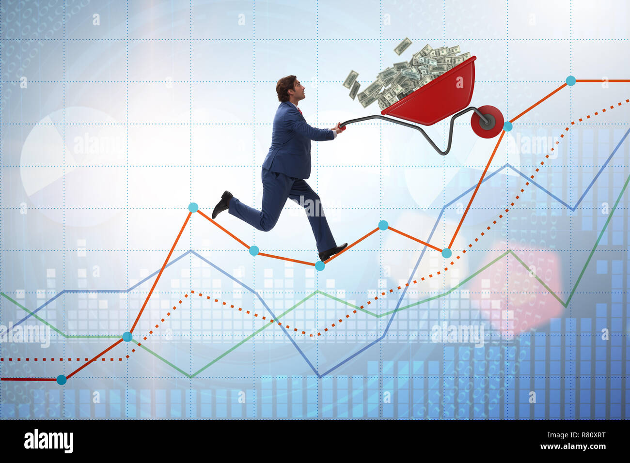 Man pushing wheelbarrow full money hi-res stock photography and images ...