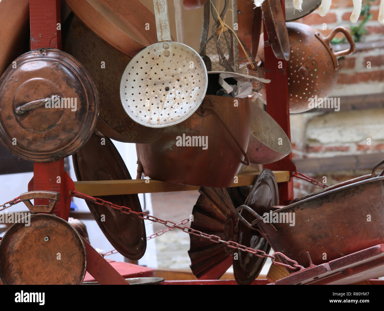 stand of ancient copper objects with pots and kitchen tools Stock Photo ...