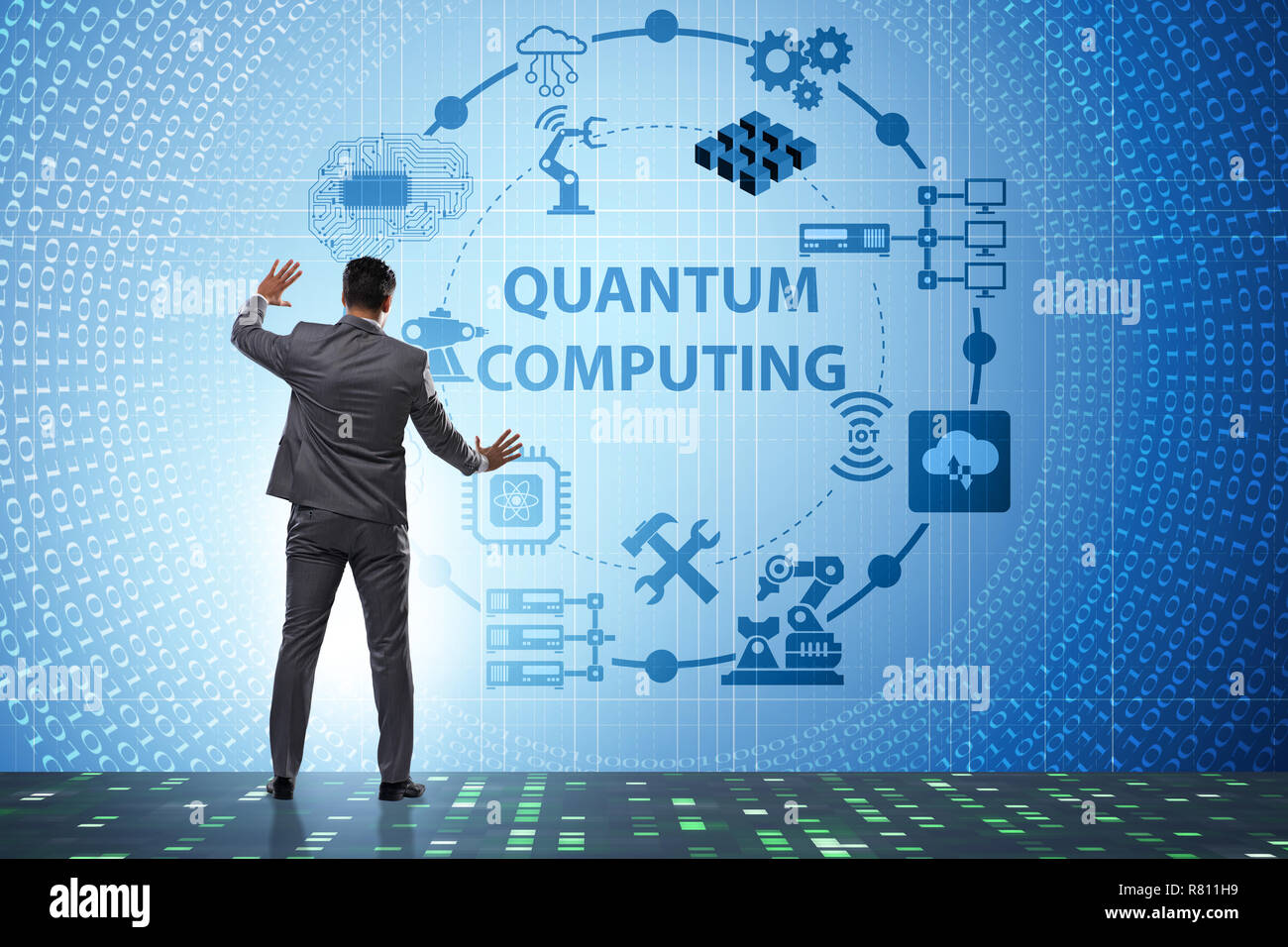 Businessman pressing virtual button in quantum computing concept Stock Photo - Alamy
