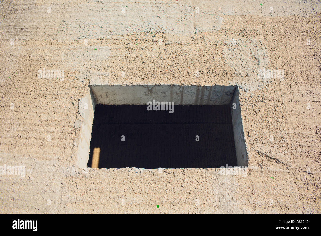 Cement wall with rectangle hole sewerage and electricity wiring Stock ...