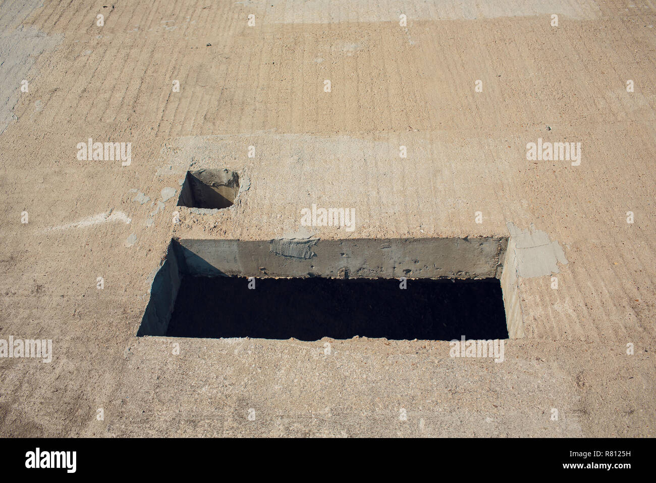 Cement wall with rectangle hole sewerage and electricity wiring Stock ...